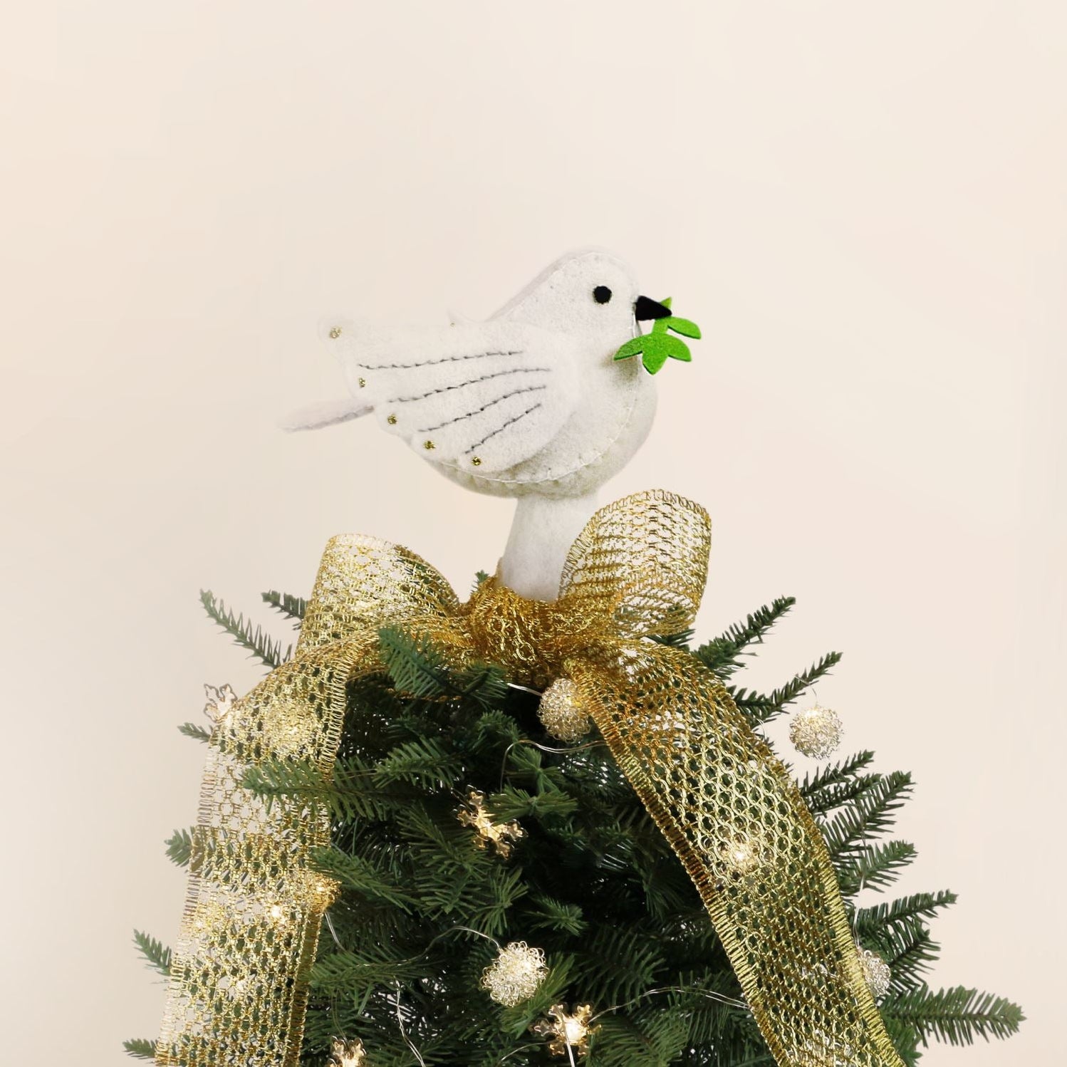 Dove of Peace Felt Tree Topper_ The Shops at Mount Vernon